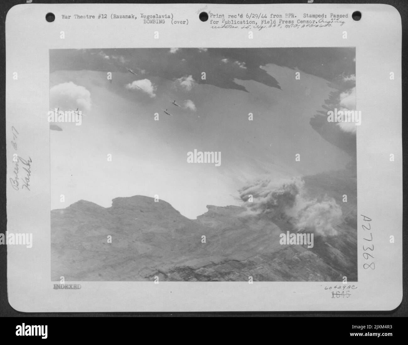 Boeing B-17 Flying Fortresses of the 15th AAF leave the target area at ...