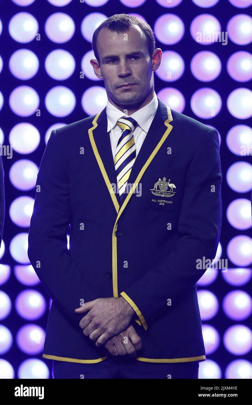 Shannon Hurn of the Eagles is presented with his All-Australian blazer ...