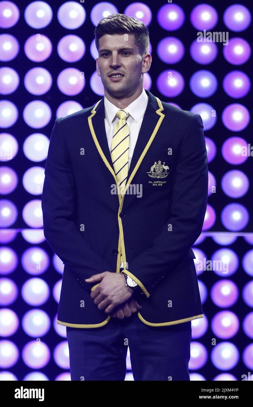 Luke Breust of the Hawks is presented with his All-Australian blazer ...