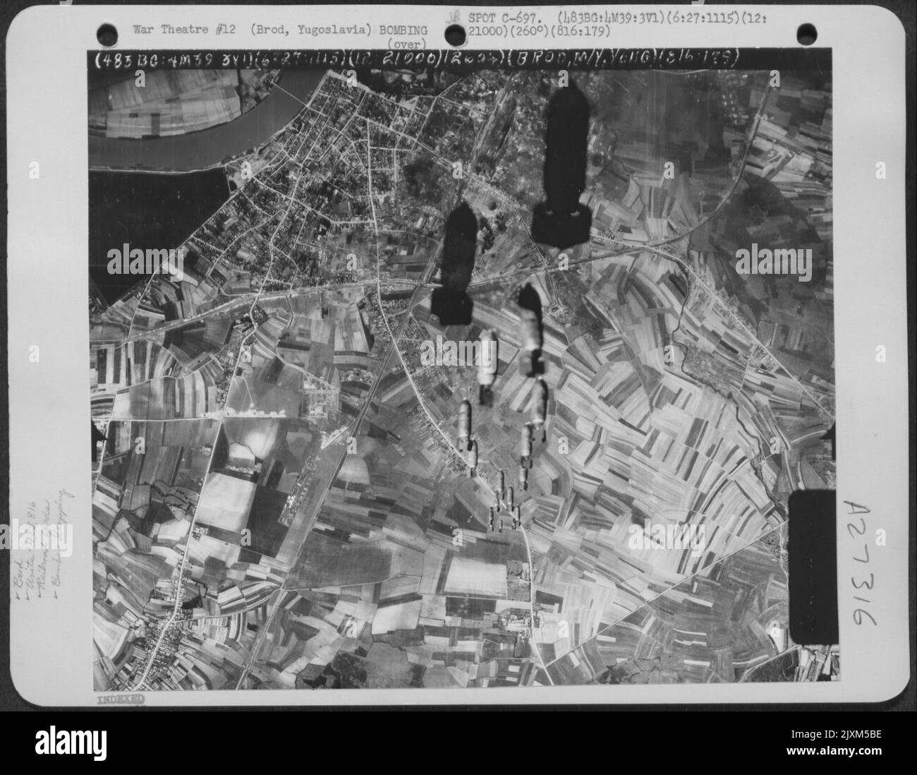 In this photograph taken during an attack by planes of the 483rd Bomb ...