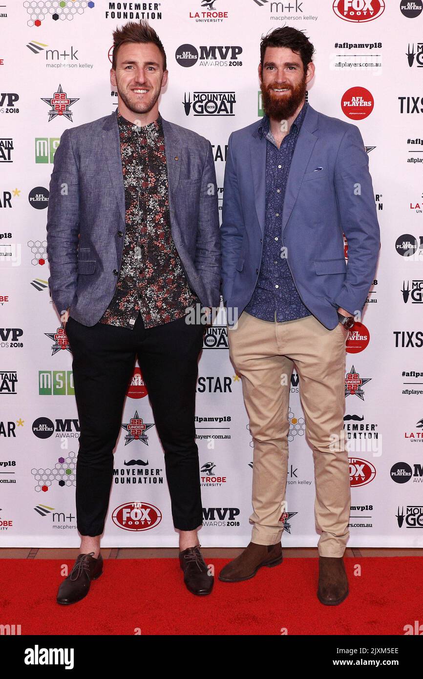 Magpies players Lynden Dunn (left) and Tyson Goldsack arrive during the ...