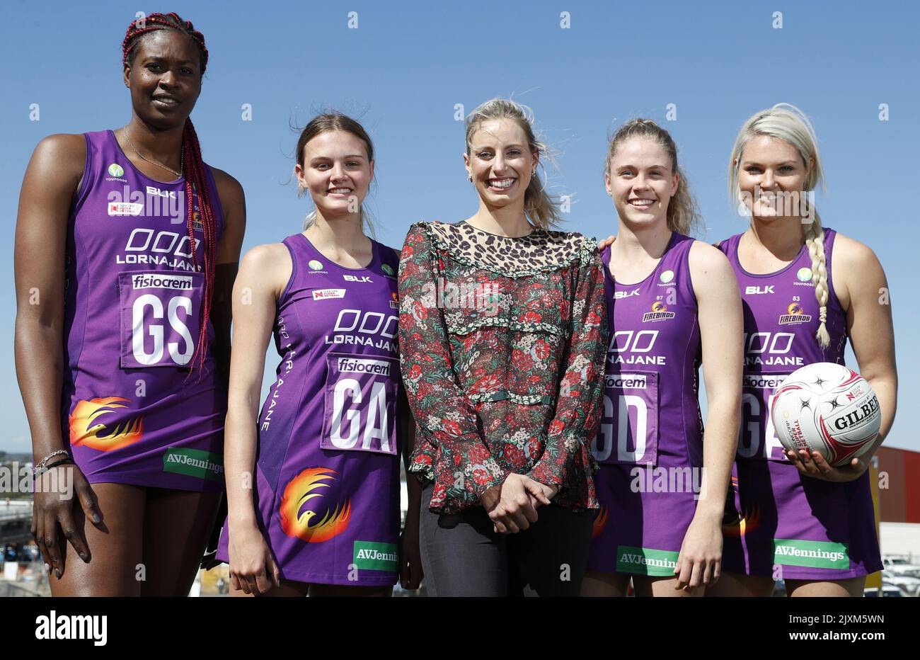Queensland Firebirds netball player Laura Geitz (centre) poses ...