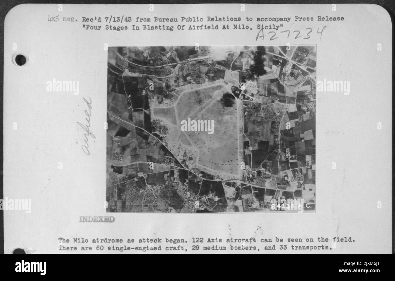 The Milo airdrome as attack began. 122 Axis aircraft can be seen on the ...