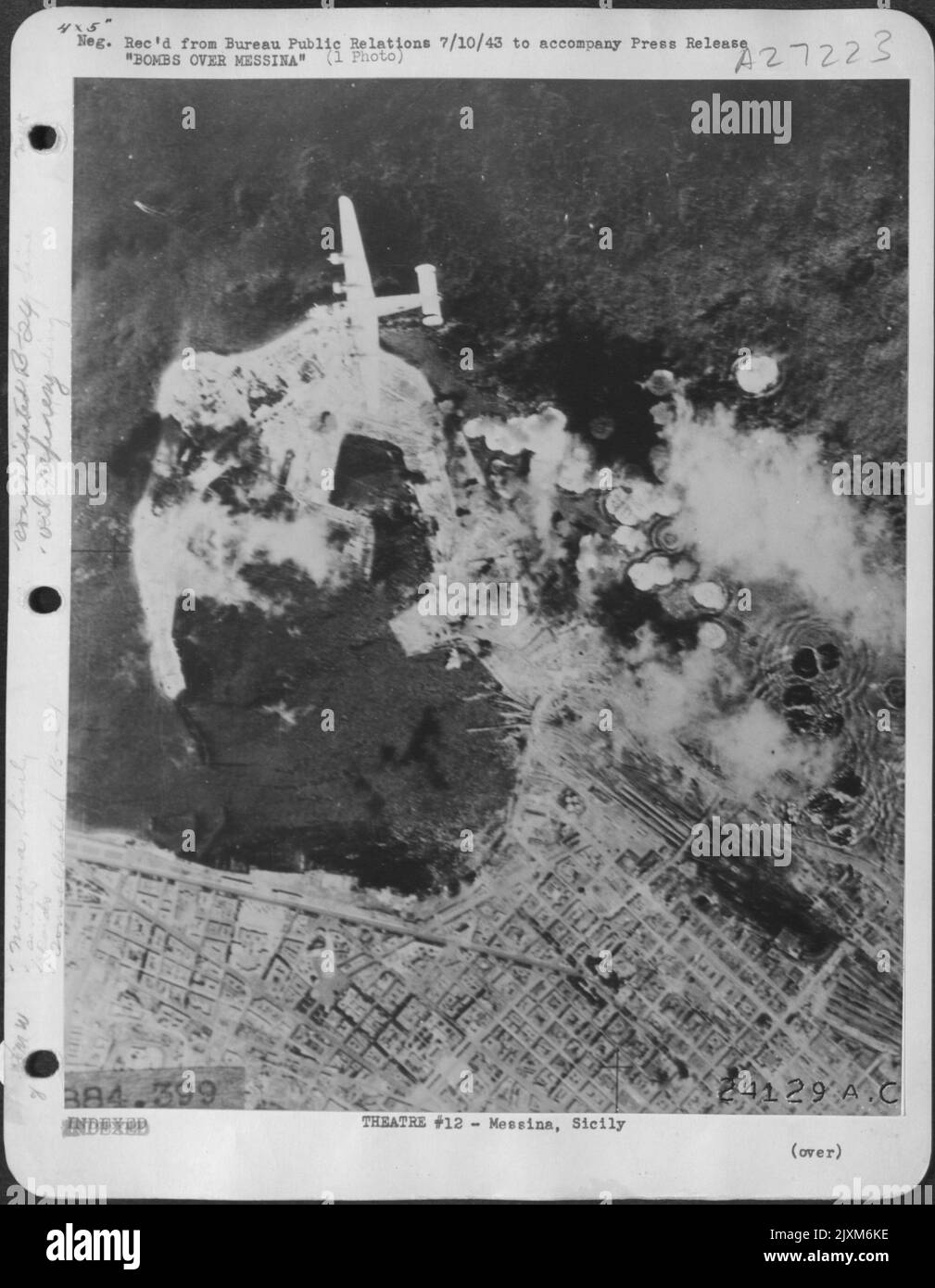 A B-24 Liberator of the Ninth U.S. Army Air Force, poised above Messina ...