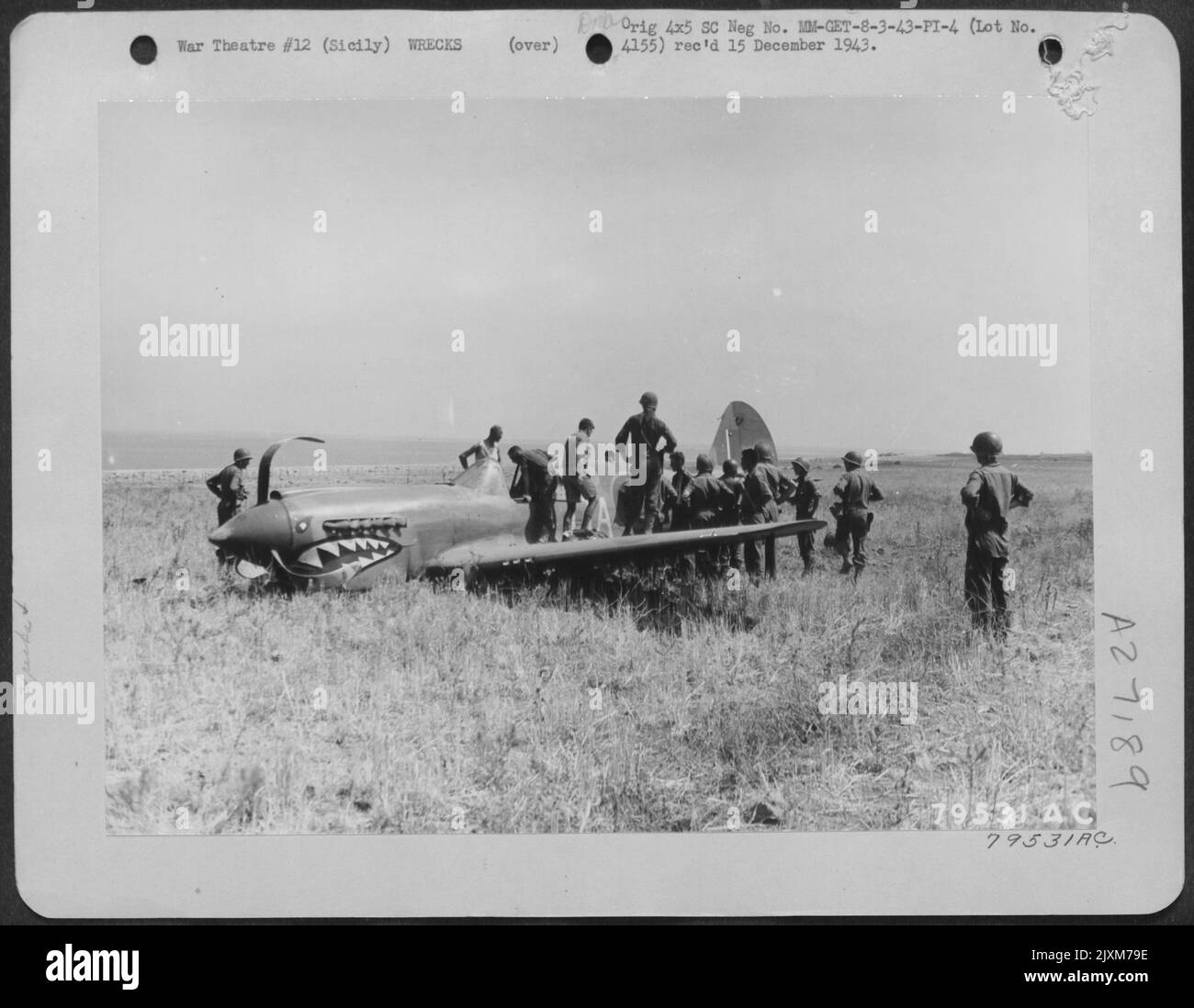A Curtiss P-40 used by the RAF, is shown after it made a crash landing ...