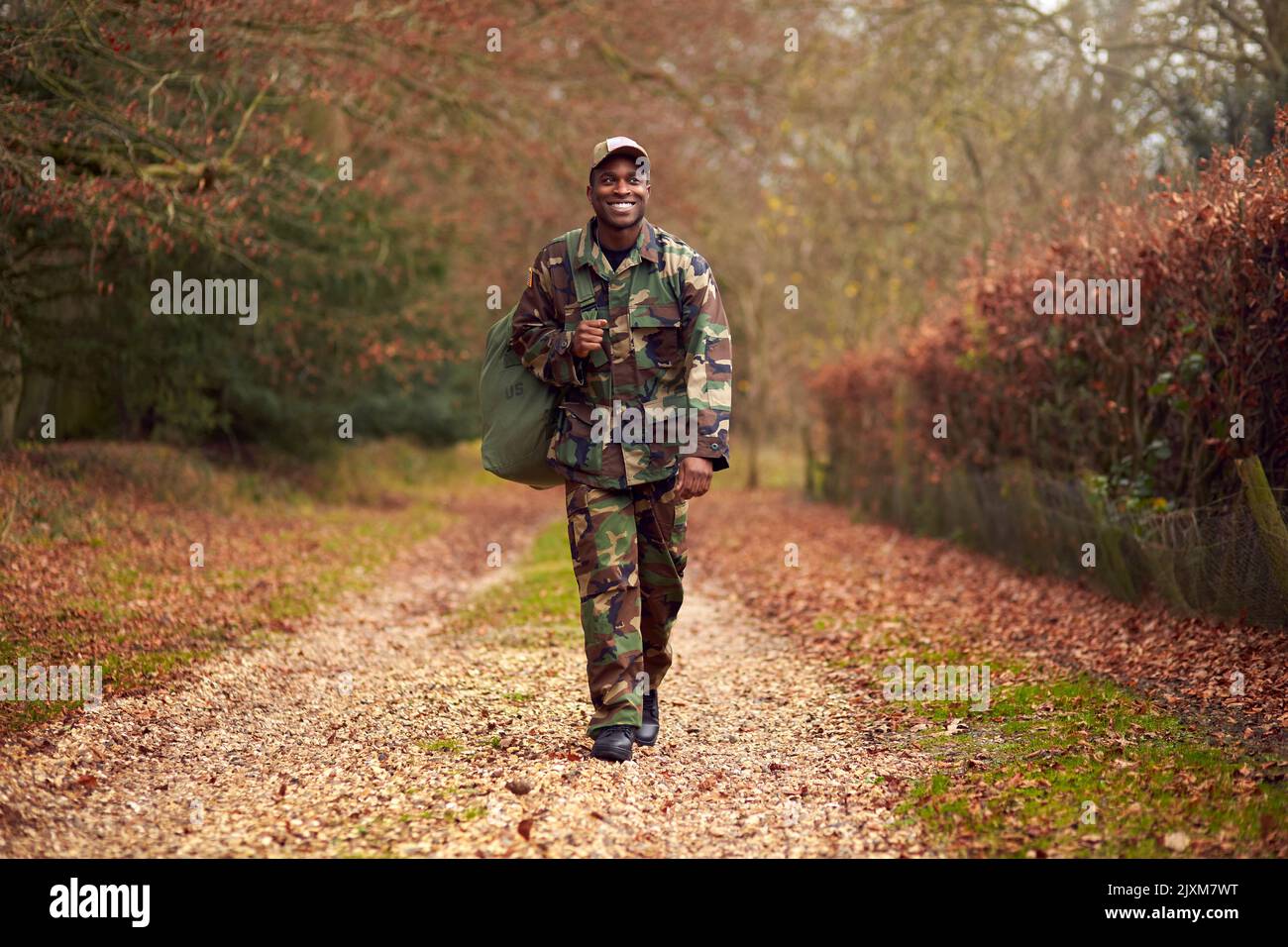 American Soldier In Uniform Carrying Kitbag Returning Home On Leave ...