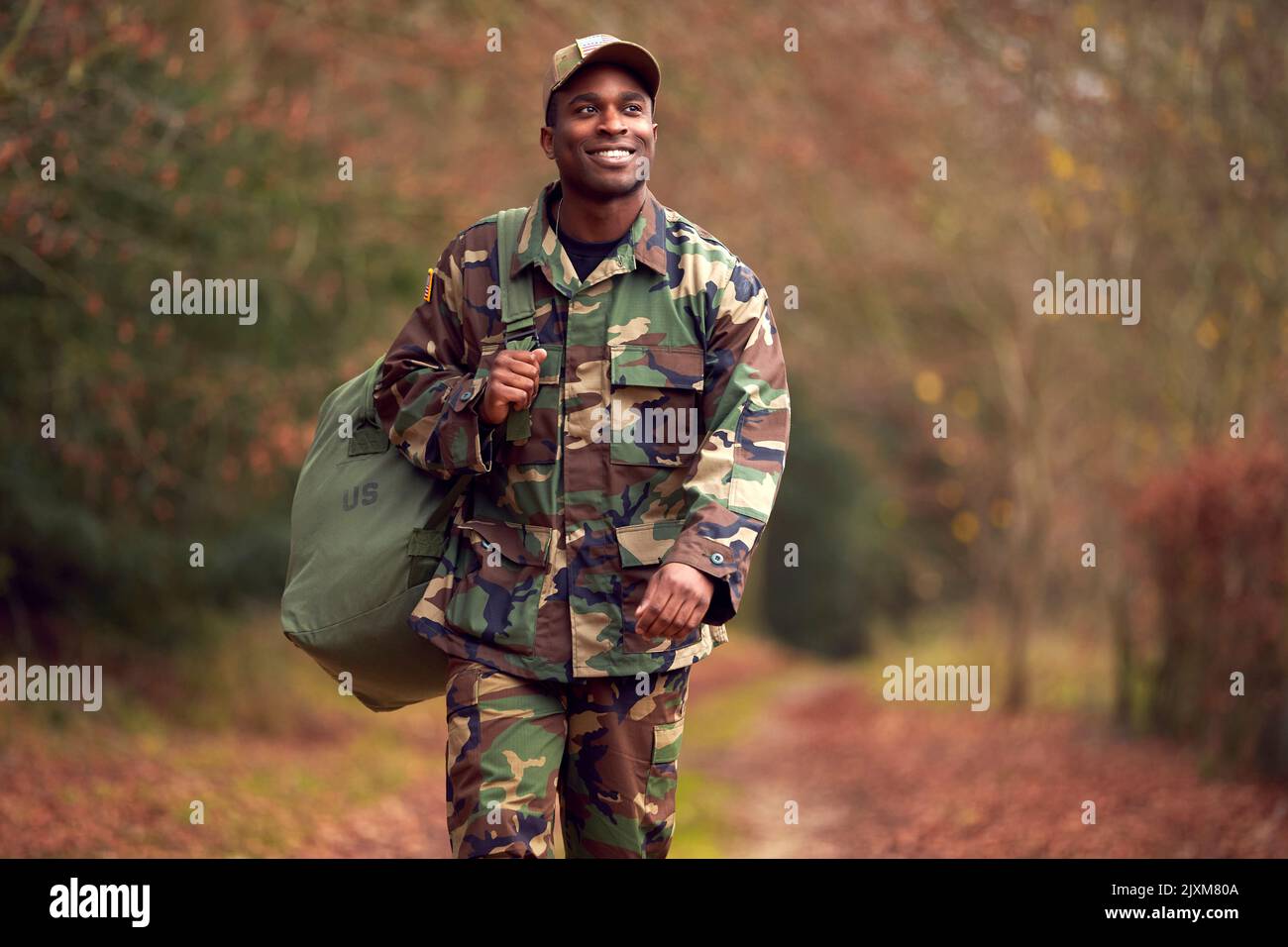 American Soldier In Uniform Carrying Kitbag Returning Home On Leave ...