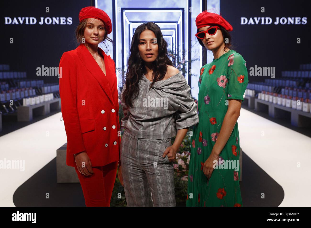 Jessica Gomes (centre) poses for a photo with models ahead of opening ...