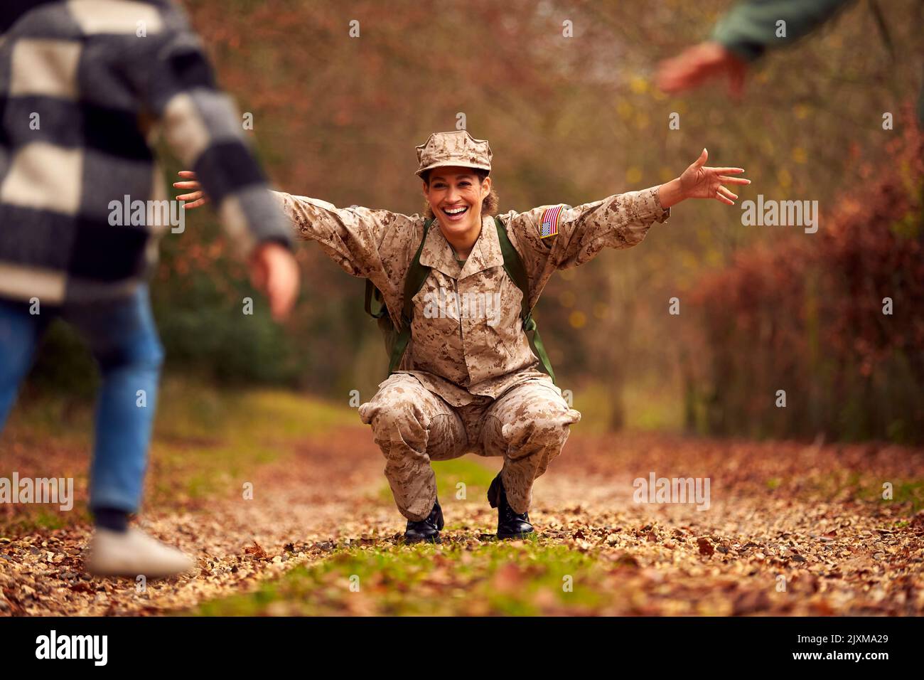 American Female Soldier In Uniform Returning Home On Leave To Family ...