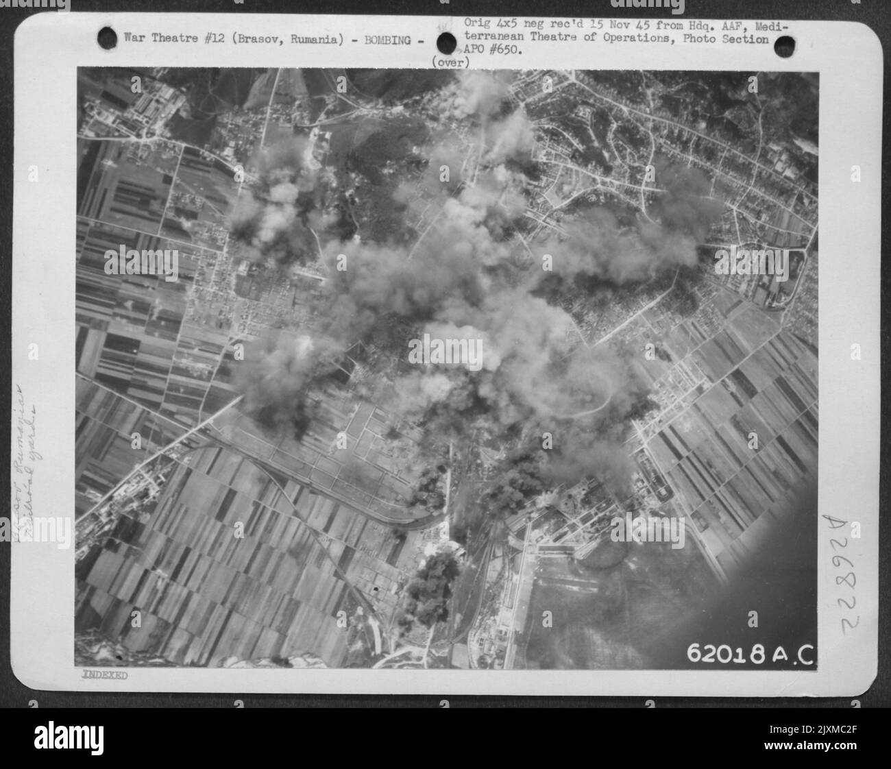 Bombs burst on the marshalling yard at Brasov, Rumania, 6 May 1944. The ...