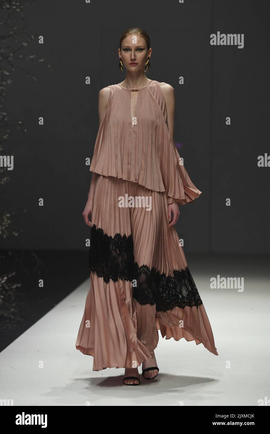 A model walks the Town Hall Runway Seven wearing a Ginger & Smart ...