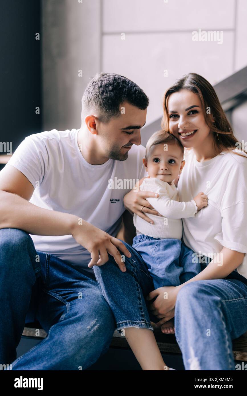 happy family with child boy play and kiss at home Stock Photo - Alamy