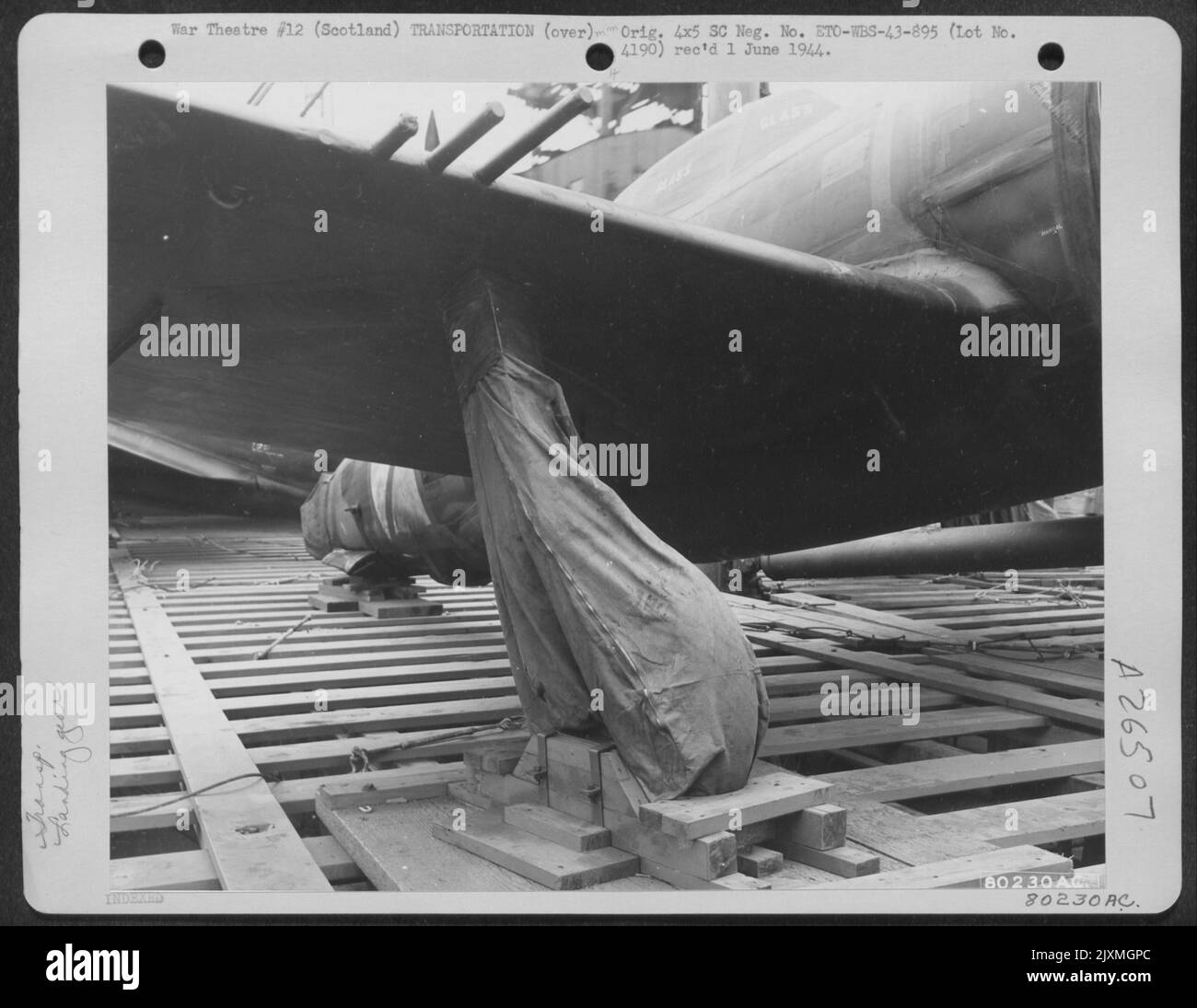 Close-up of a landing wheel of a Republic P-47, heavily enshrouded for ...
