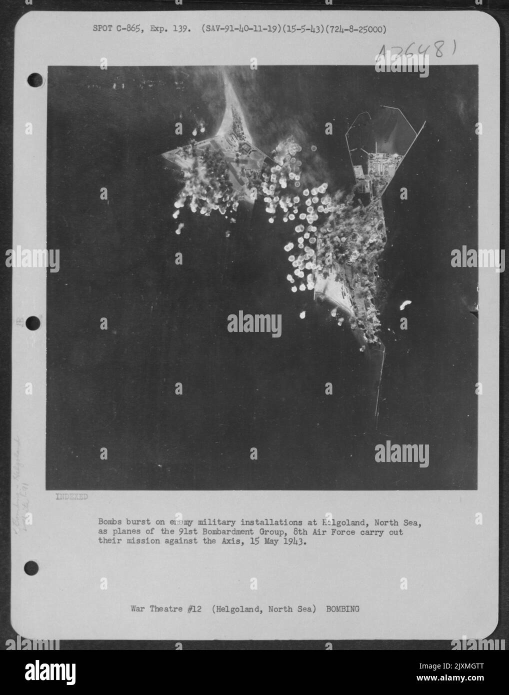 Bombs burst on enemy military installations at Helgoland, North Sea, as ...