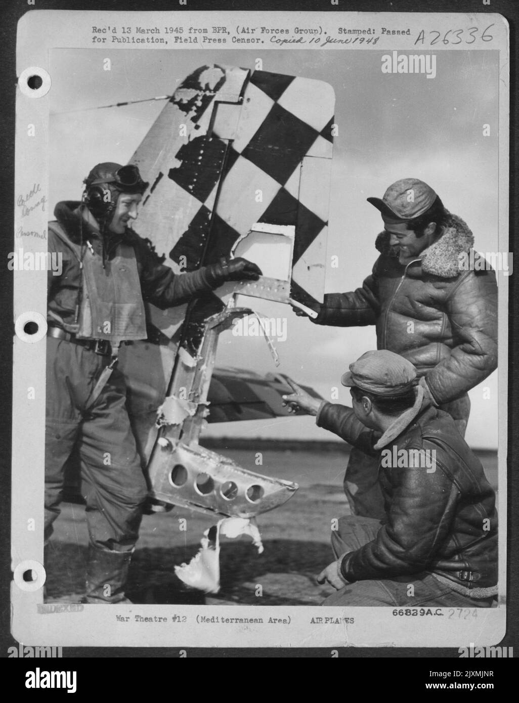 2nd Lt. Kenneth A. Stenglein, of Champlin, Minn., examines the damaged ...