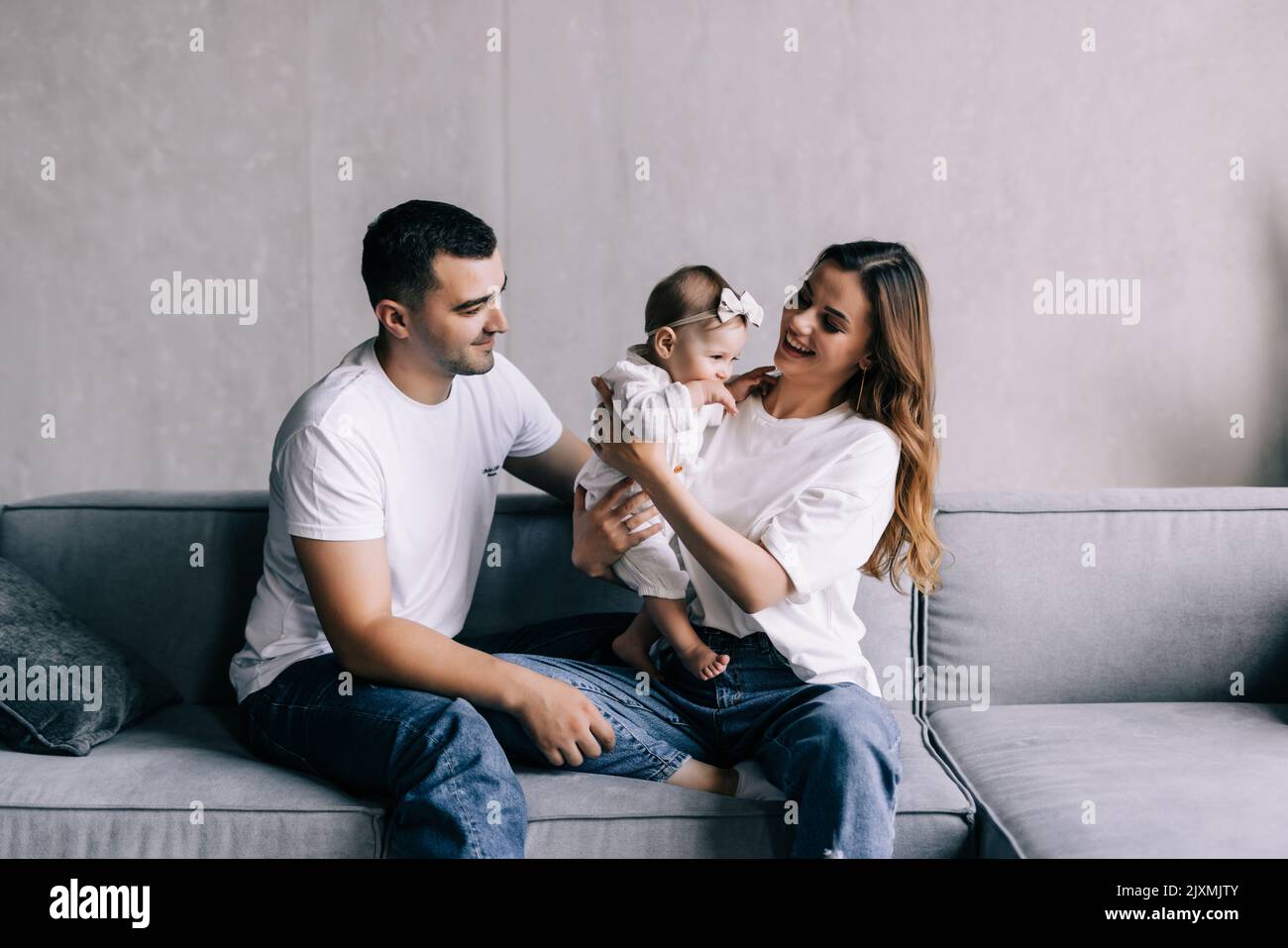 family, parenthood and people concept - happy mother, father and baby ...