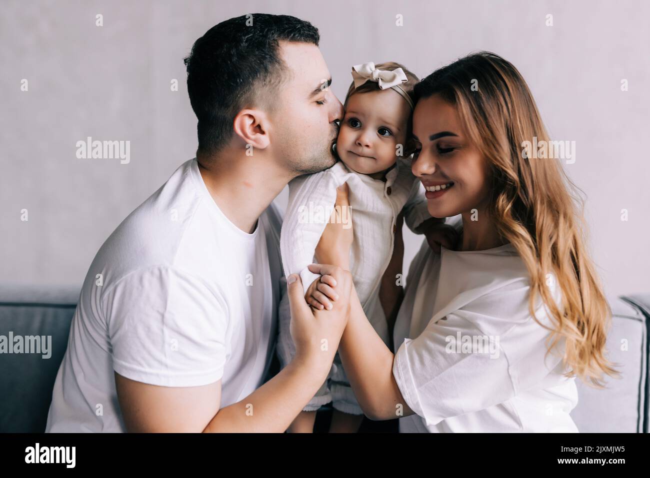 family, parenthood and people concept - happy mother, father and baby ...