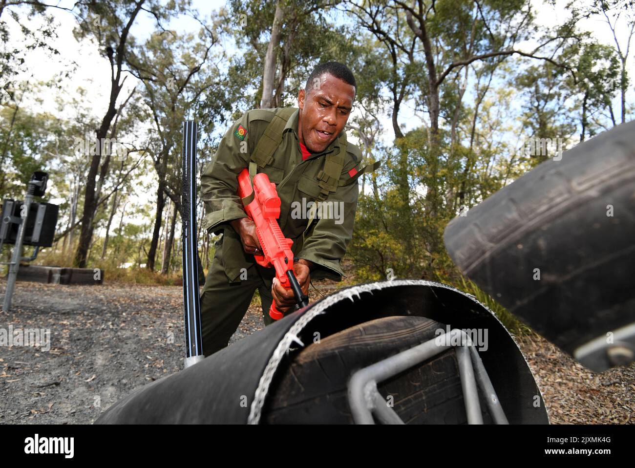 A soldier from the 3rd Fiji Infantry Regiment takes part in a military ...