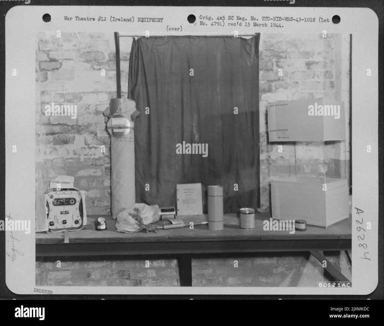 Photo showing from left to right, a dinghy radio set; a signal lamp; a ...