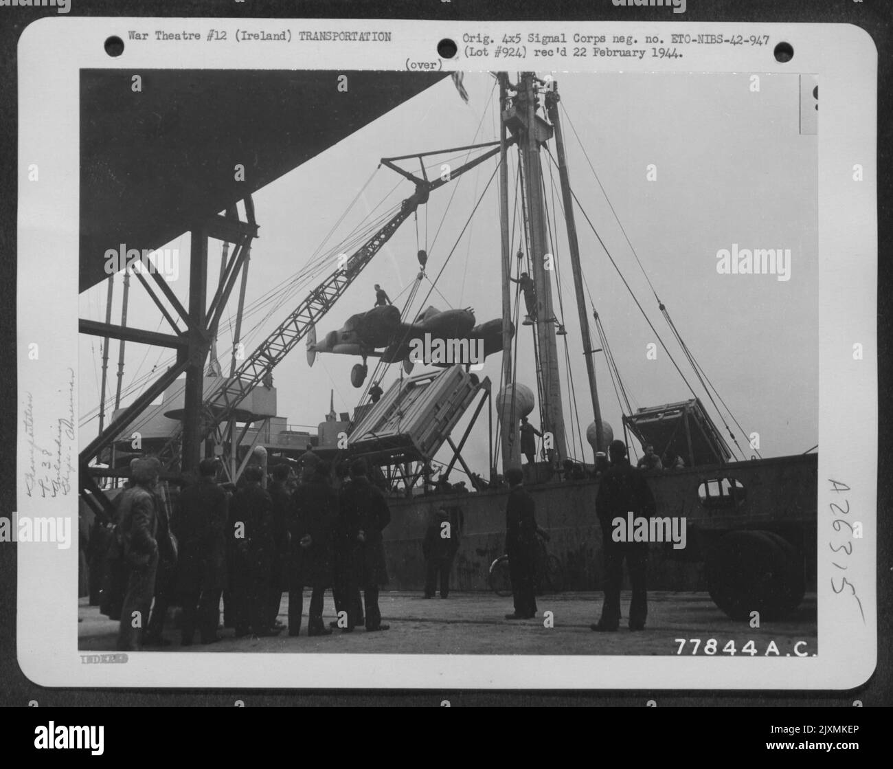 Lockheed Aircraft Corporation workers in Northern Ireland unload a ...