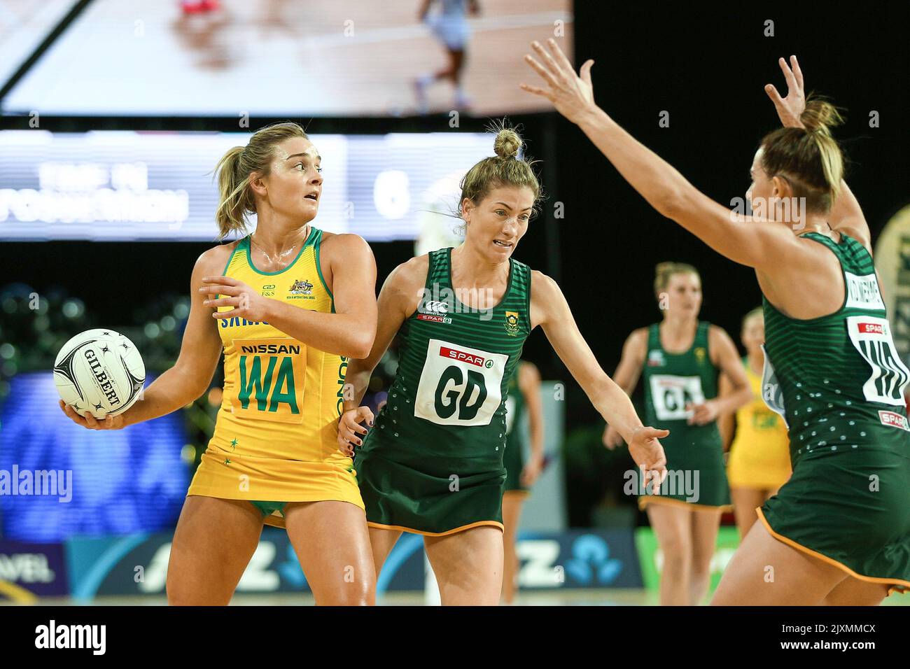 Liz Watson of the Diamonds is challenged by Karla Pretorius of the ...