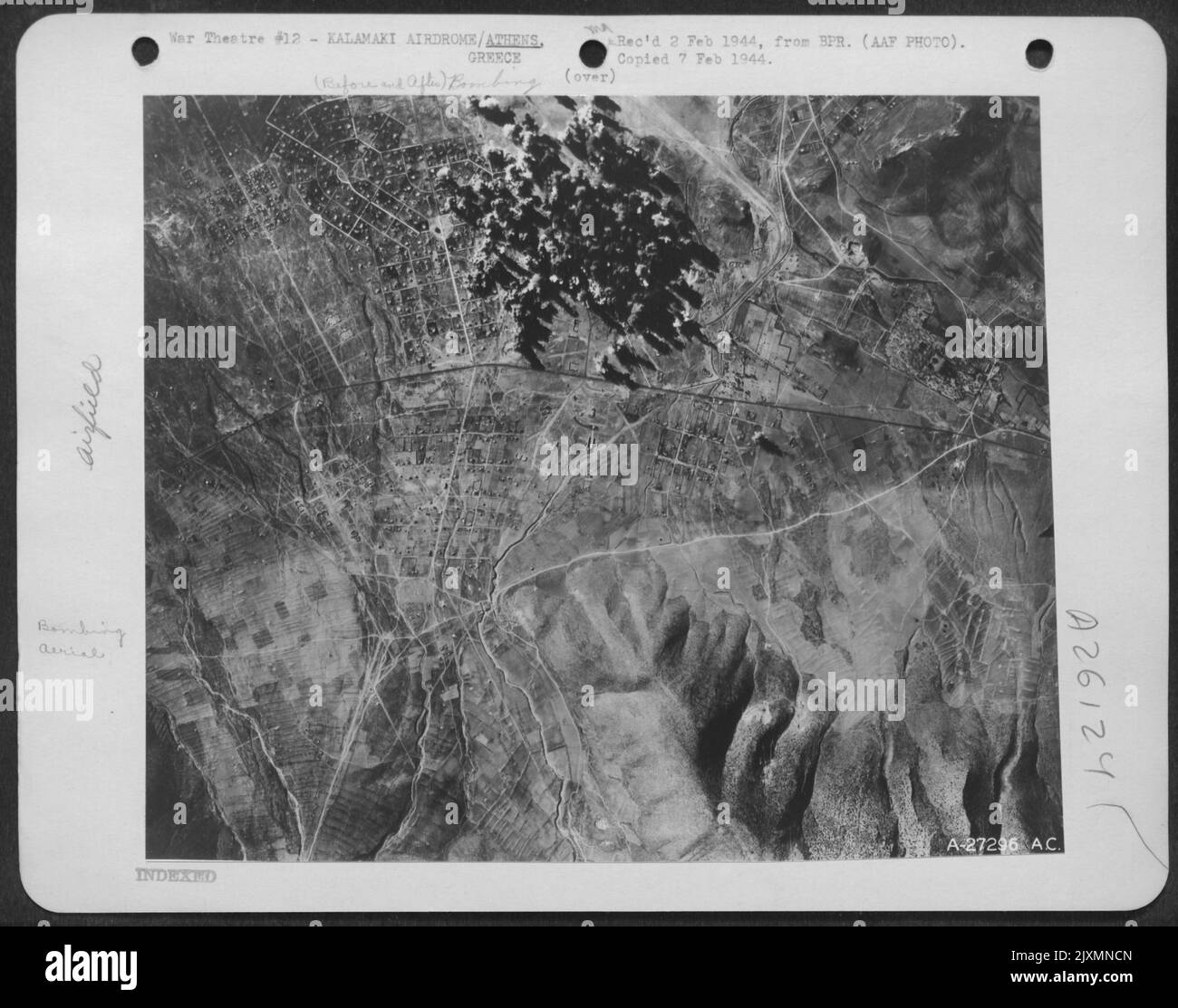 Bombs from Flying Fortresses of the 15th AAF blast the airfield at Kalamaki, south of Athens ...
