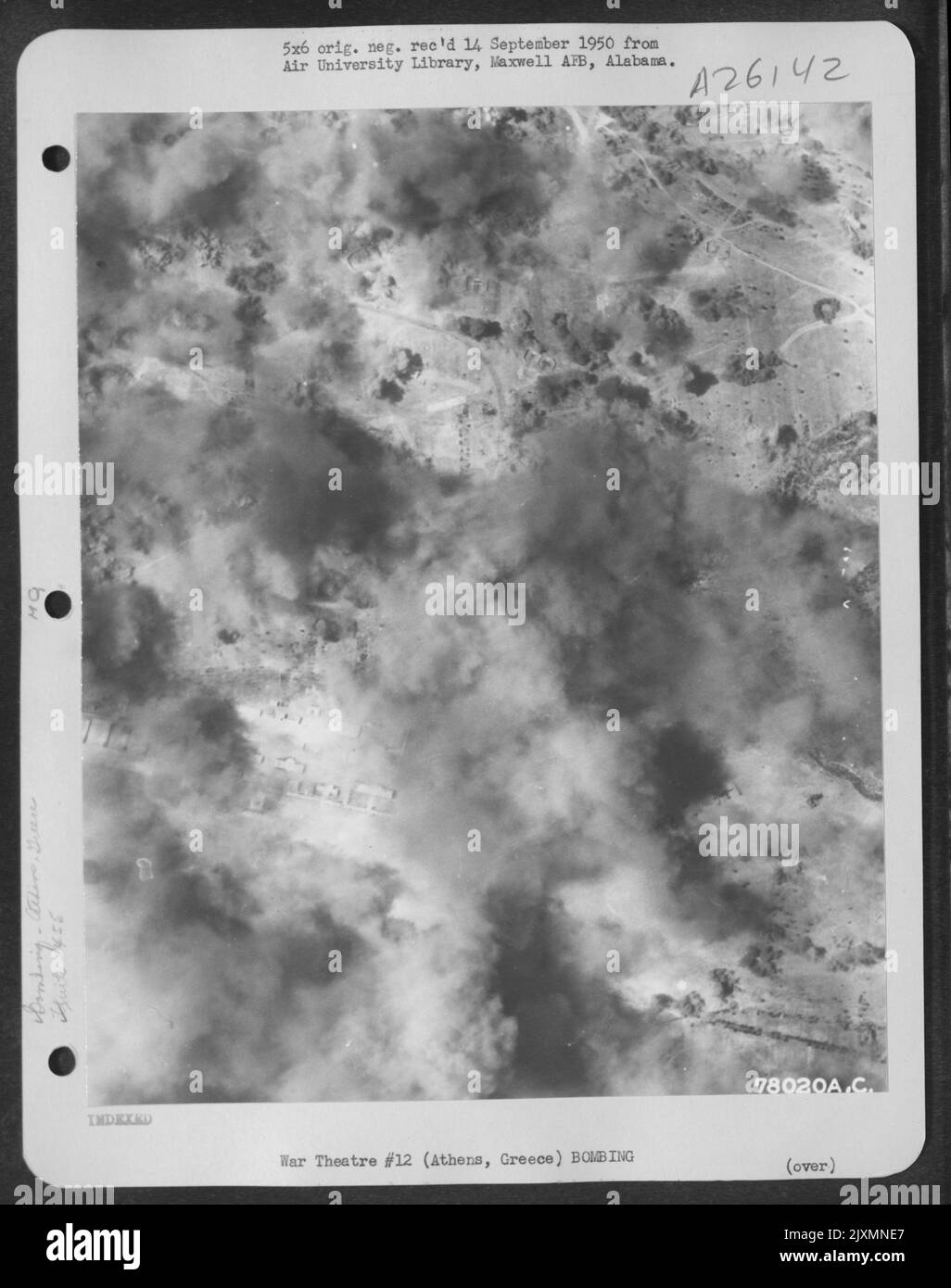 Smoke rises from Tatoi Airdrome, Athens, Greece, as bombs, dropped by ...