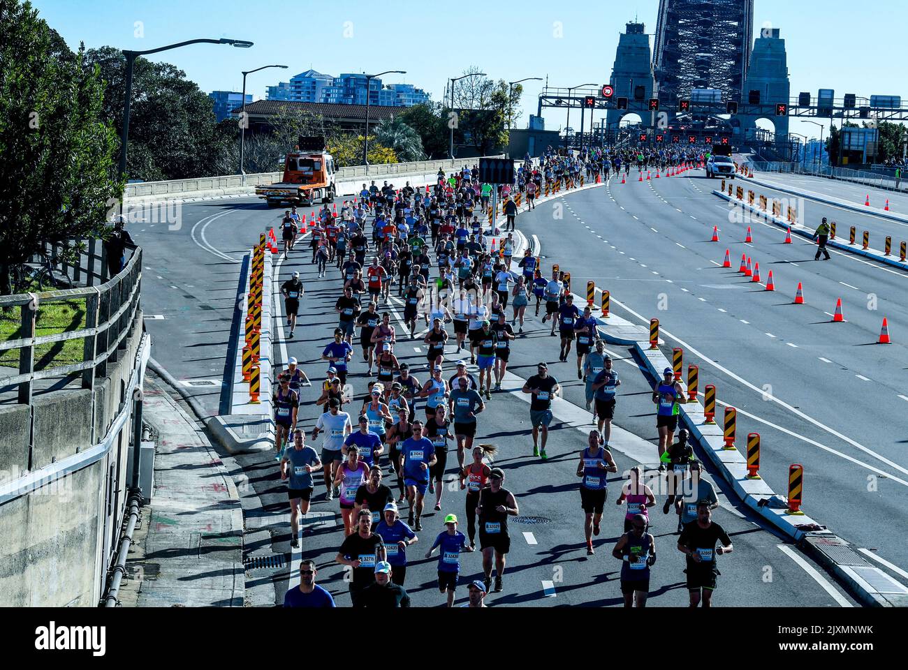 Runners are seen crossing the Sydney Harbour Bridge during the Blackmore's Sydney Running ...
