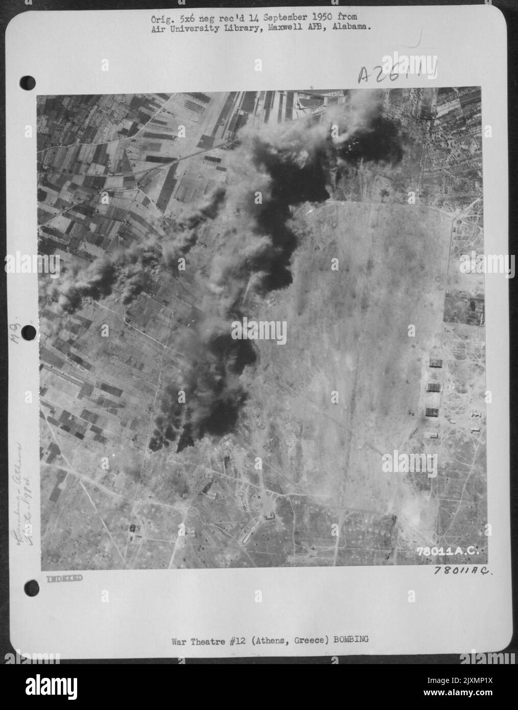 Bombs, dropped by planes of 98th Bomb Group, burst on Eleusis Airdrome ...