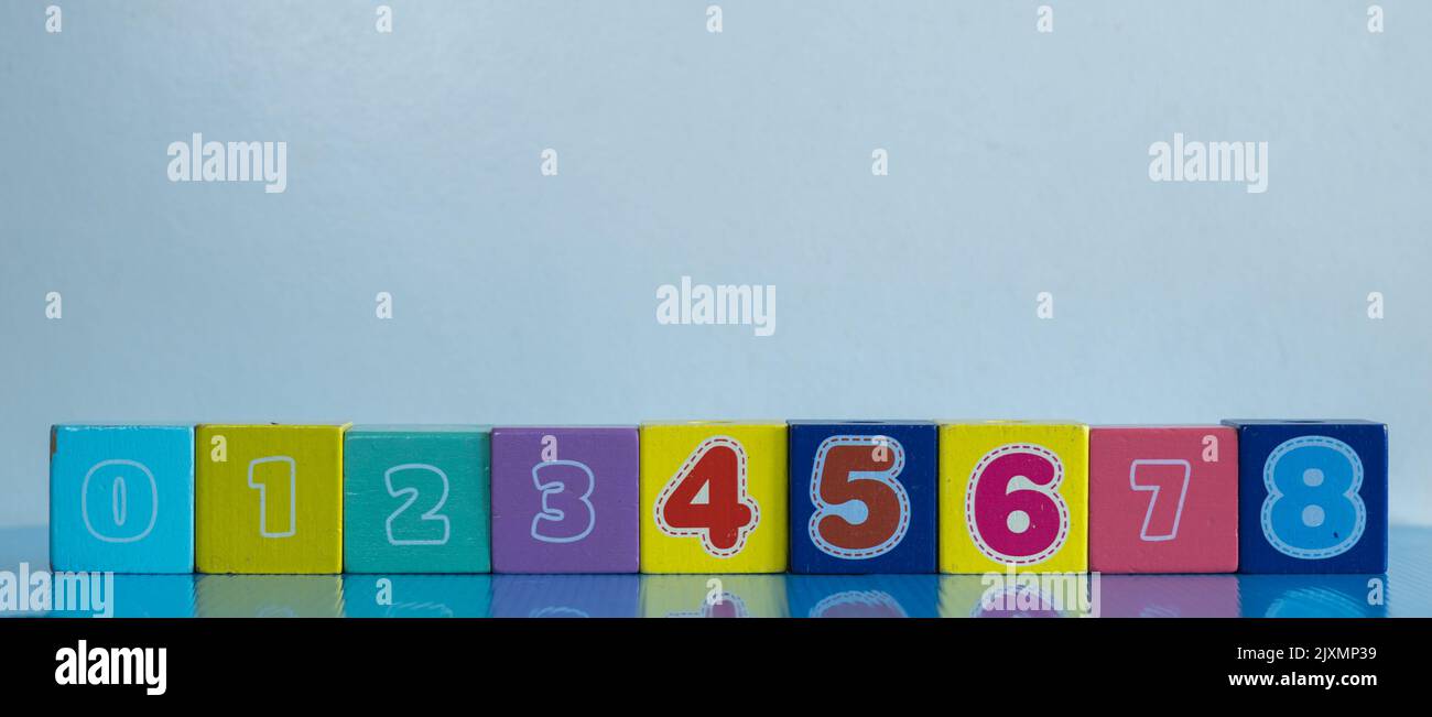 The kids' colorful cube toys with the numbers Stock Photo - Alamy