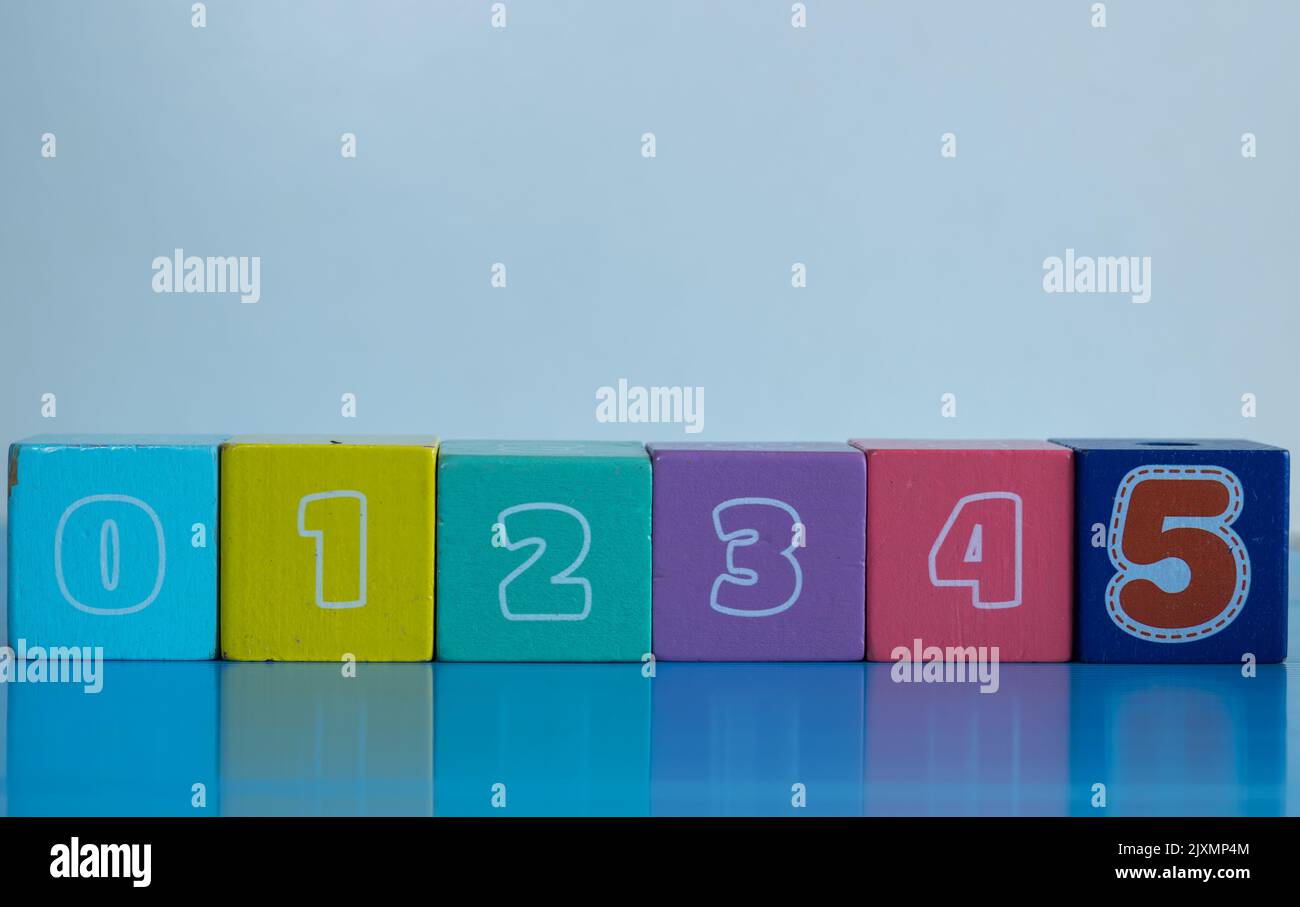 The kids' colorful cube toys with the numbers Stock Photo - Alamy