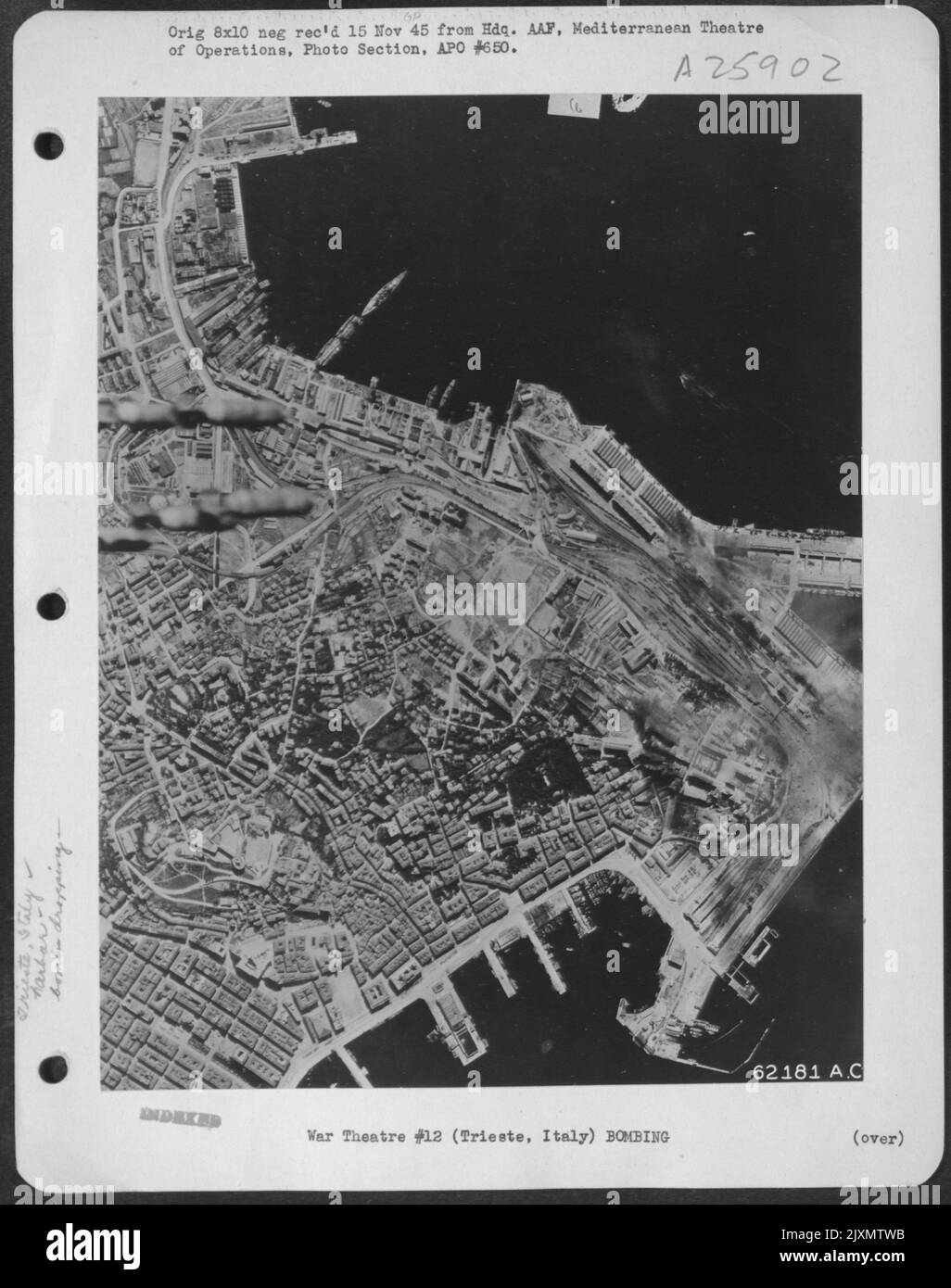 Bombs hurtle down toward harbor installations at Trieste, Italy as ...