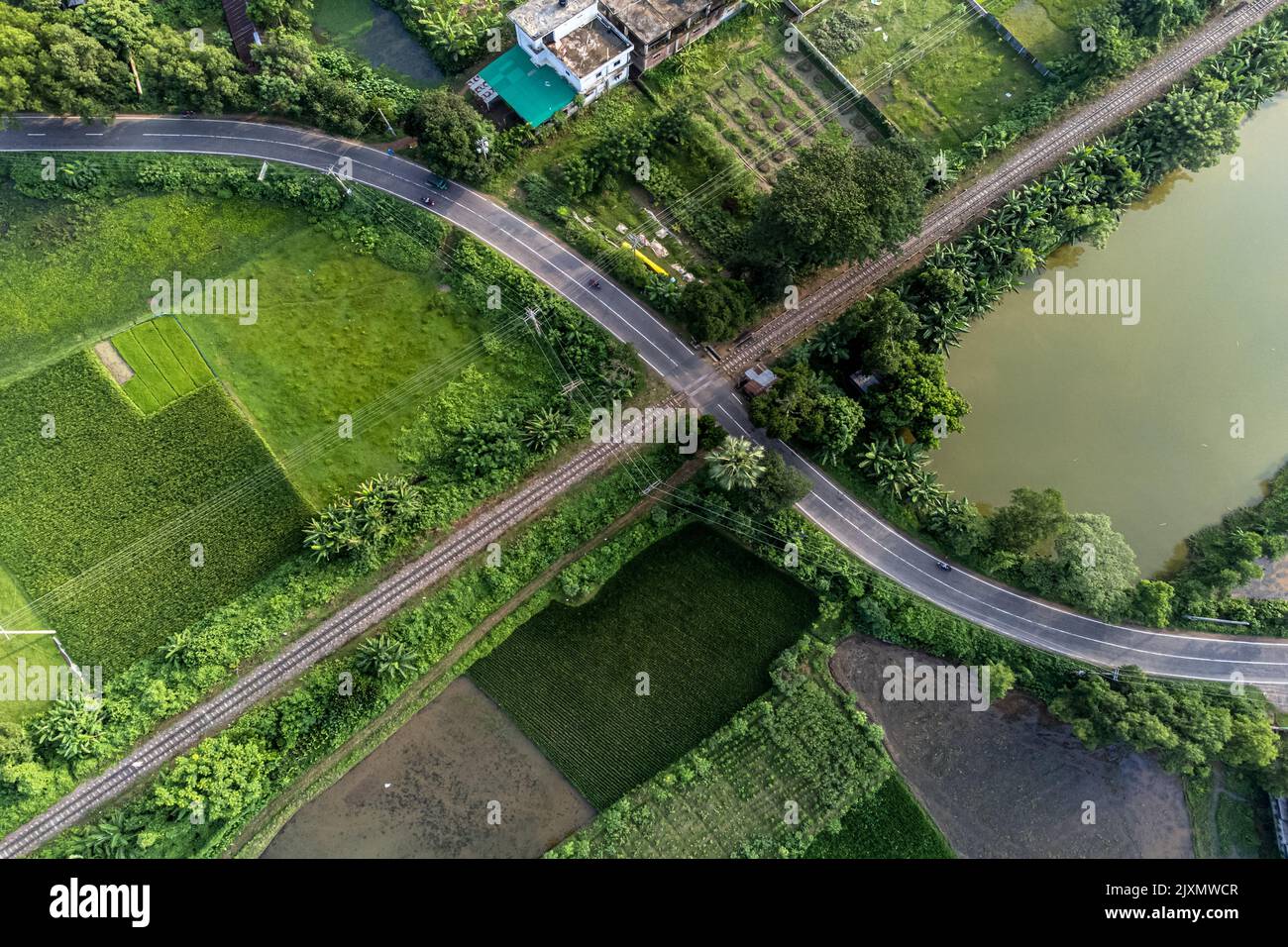 Aerial view of crossing railway line and bus line Stock Photo - Alamy
