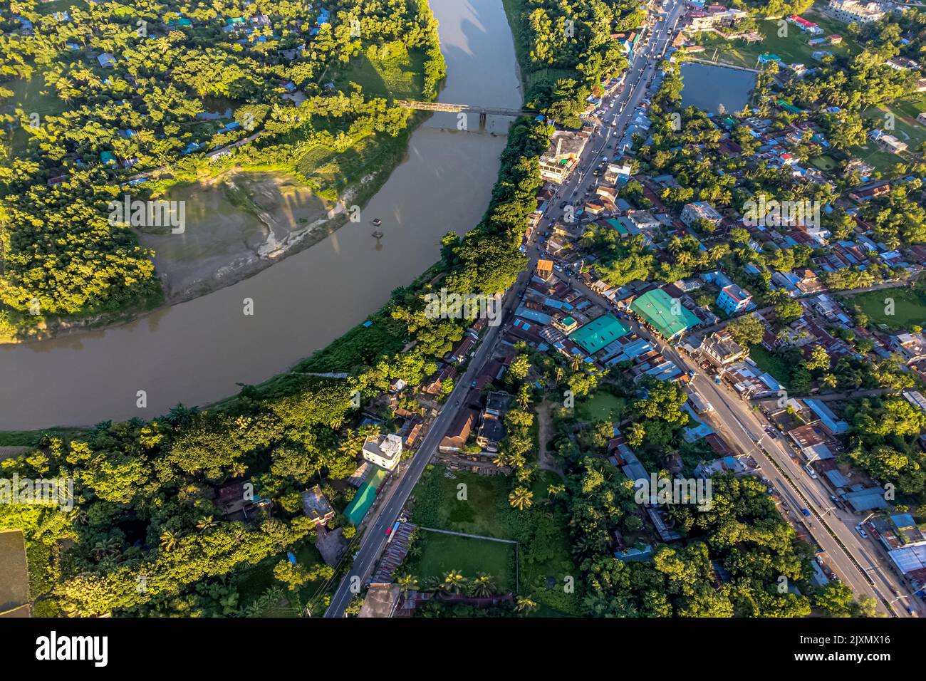 Aerial view of the river and a small town side by side Stock Photo - Alamy