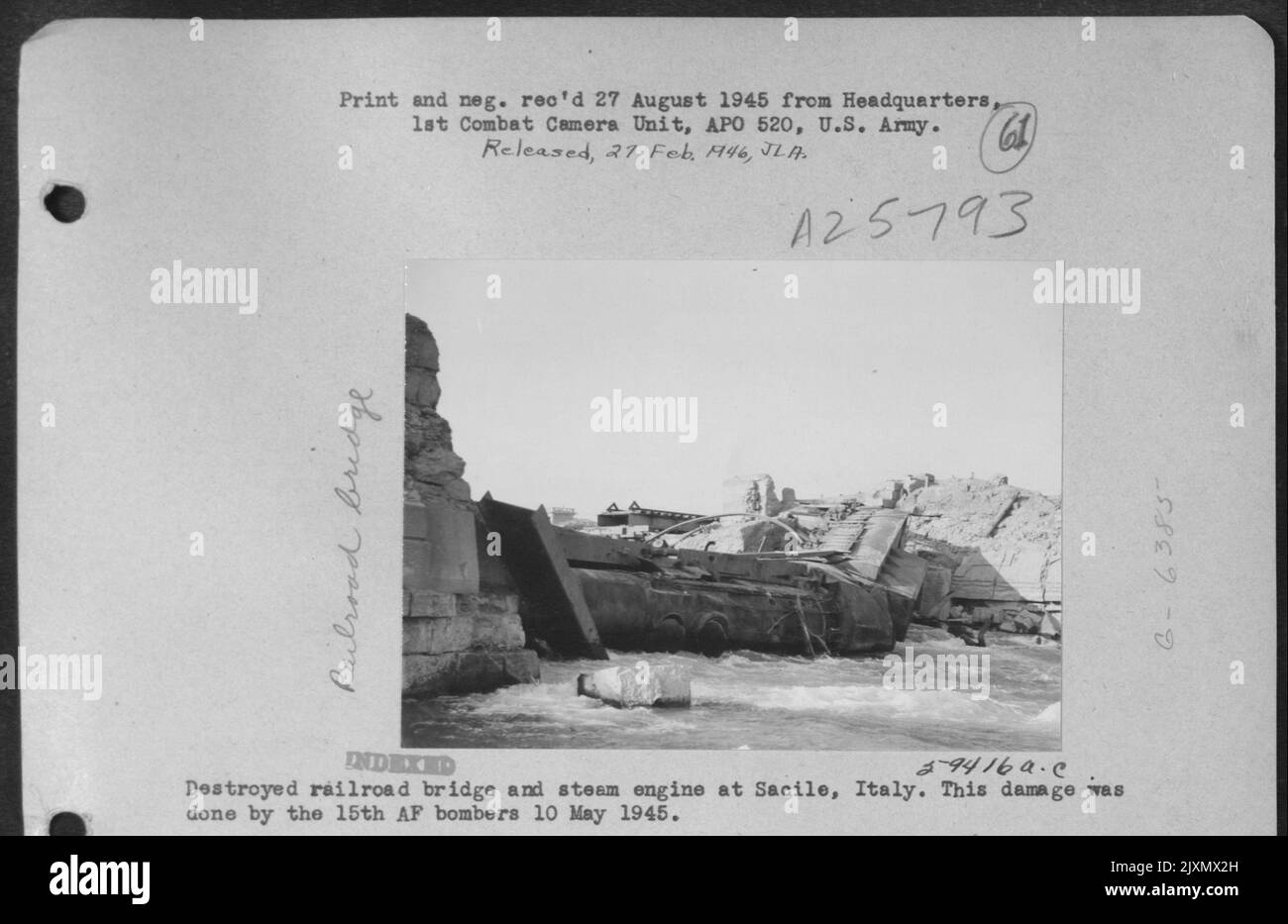 Destroyed railroad bridge and steam engine at Sacile, Italy. This ...