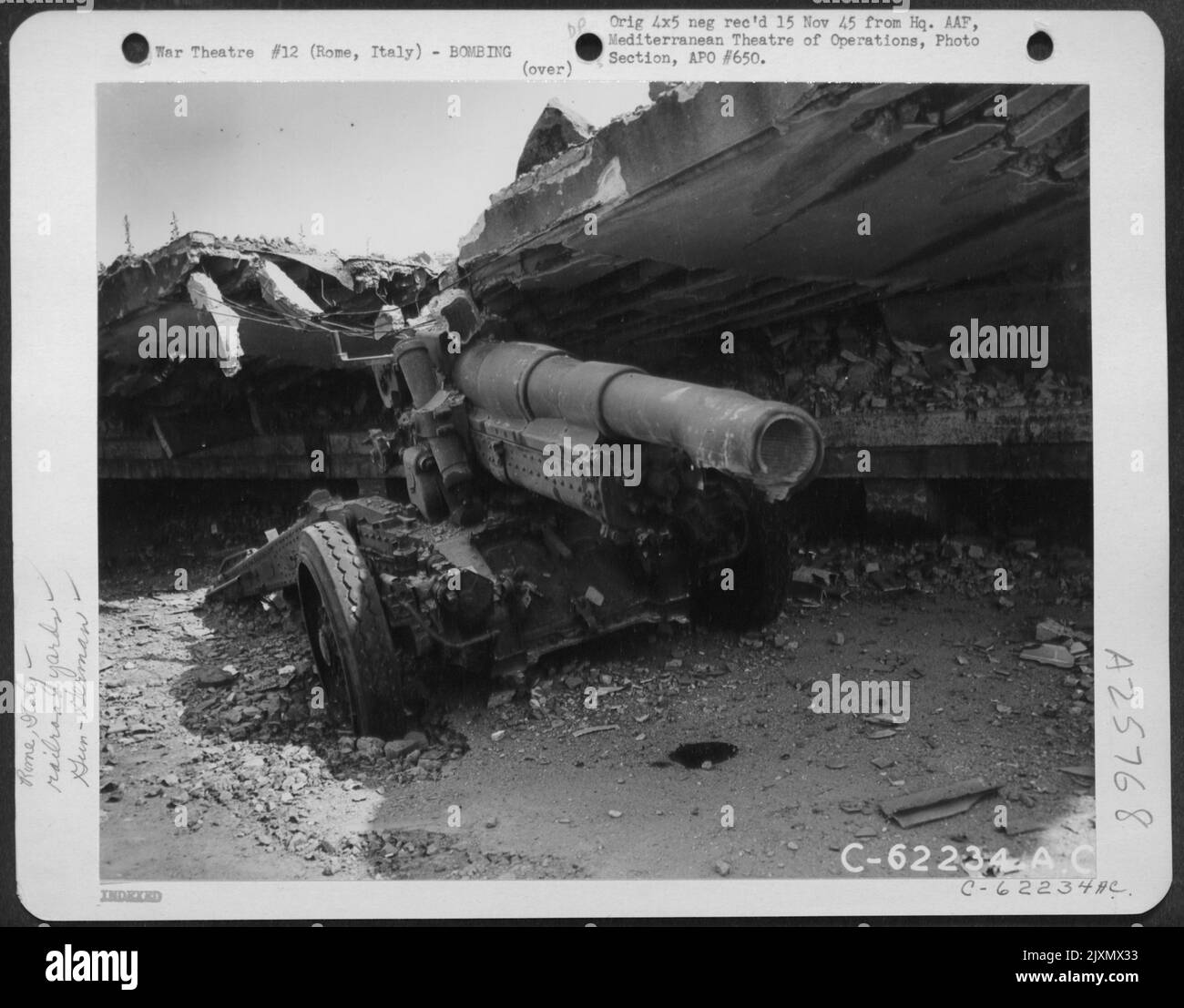 Bomb damage to gun in the Ostiense Railroad Yards on the outskirts of ...
