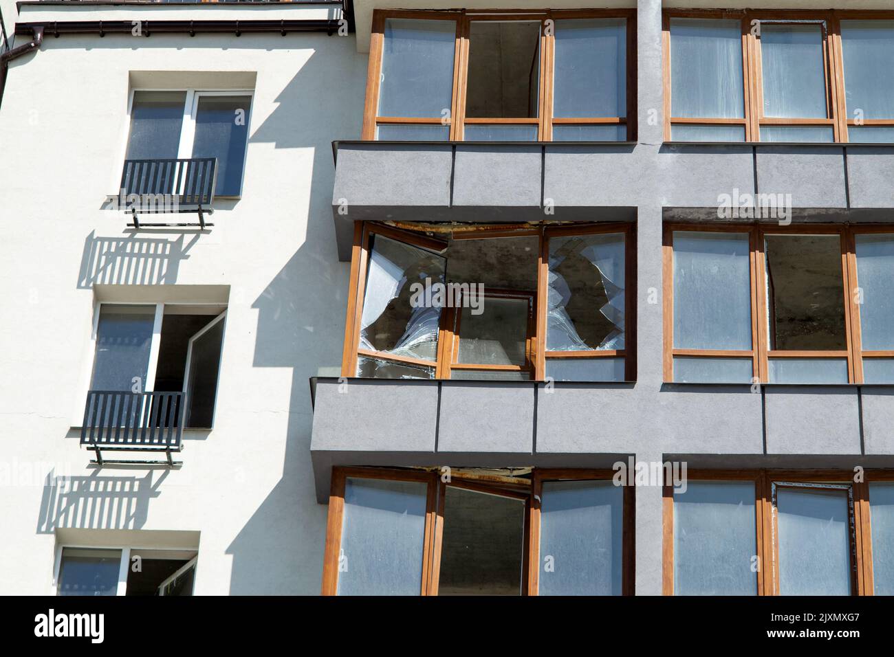 Broken windows of residential civilian building after Russian rocket ...
