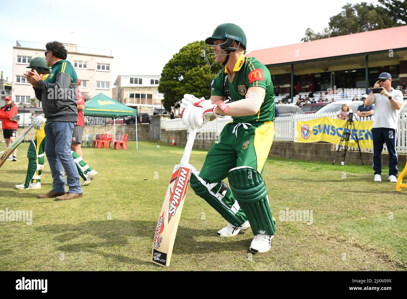 Randwick Petersham batsman David Warner takes to the field during a ...