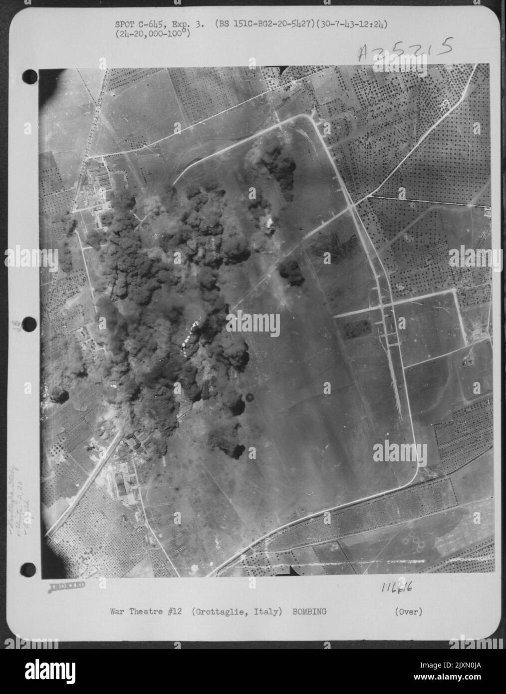 Bomb Bursts Cover Installations At Grottaglie Airdrome, Italy, On 30 ...