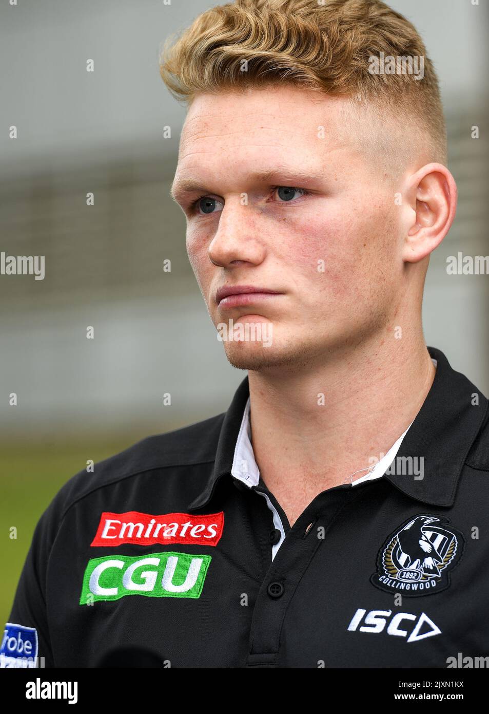 Collingwood player Adam Treloar addresses the media in Melbourne ...