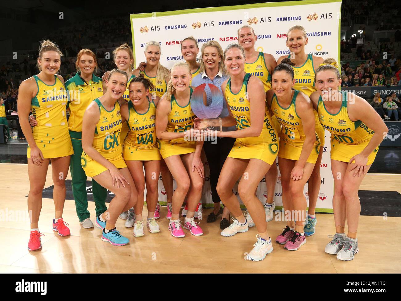 The Diamonds pose with the trophy after the Netball Quad Series match ...
