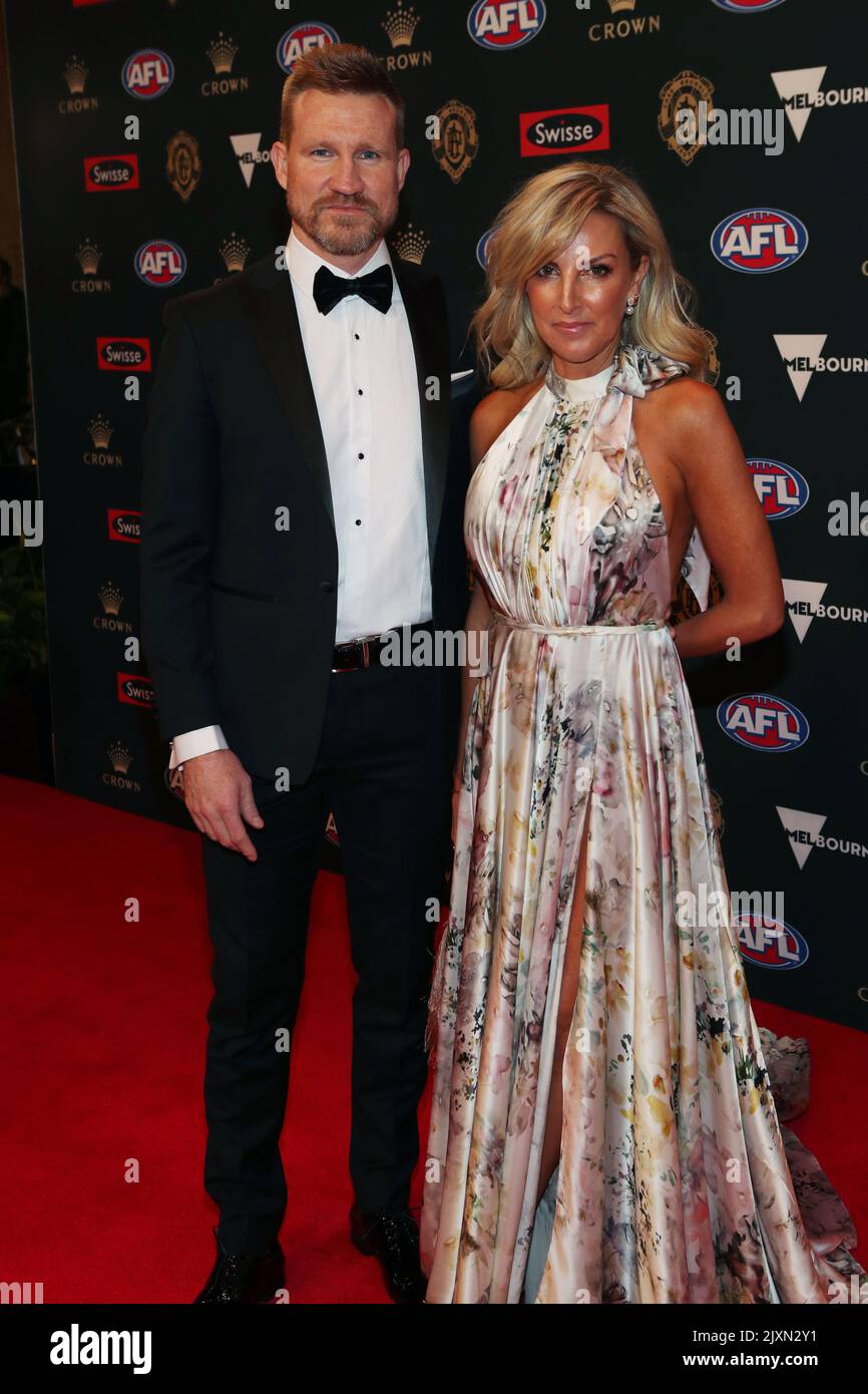 Collingwood coach Nathan Buckley and his wife Tania Buckley pose for a ...