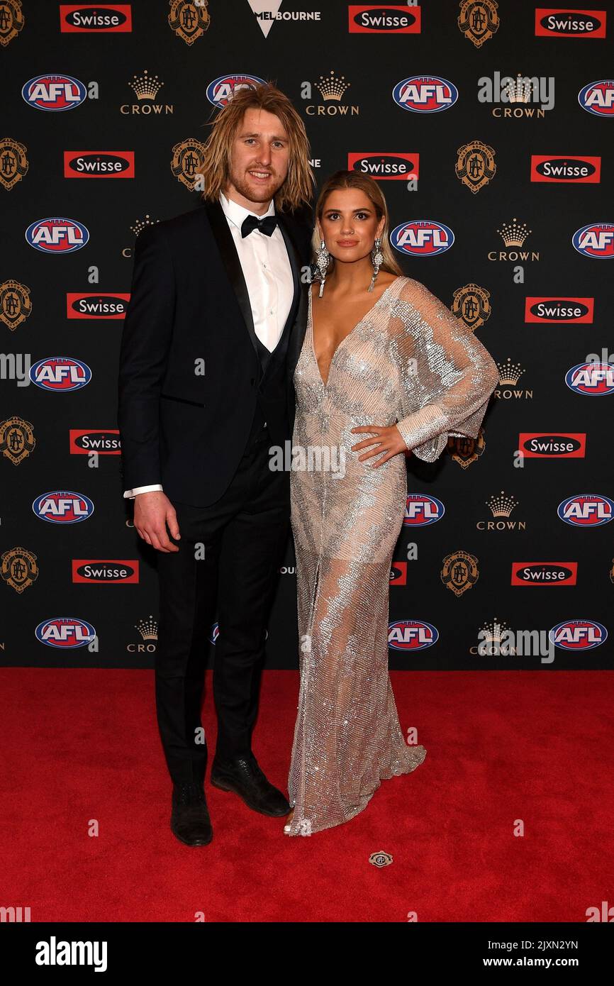Dyson Heppell of Essendon and partner Kate Turner pose for a photograph ...