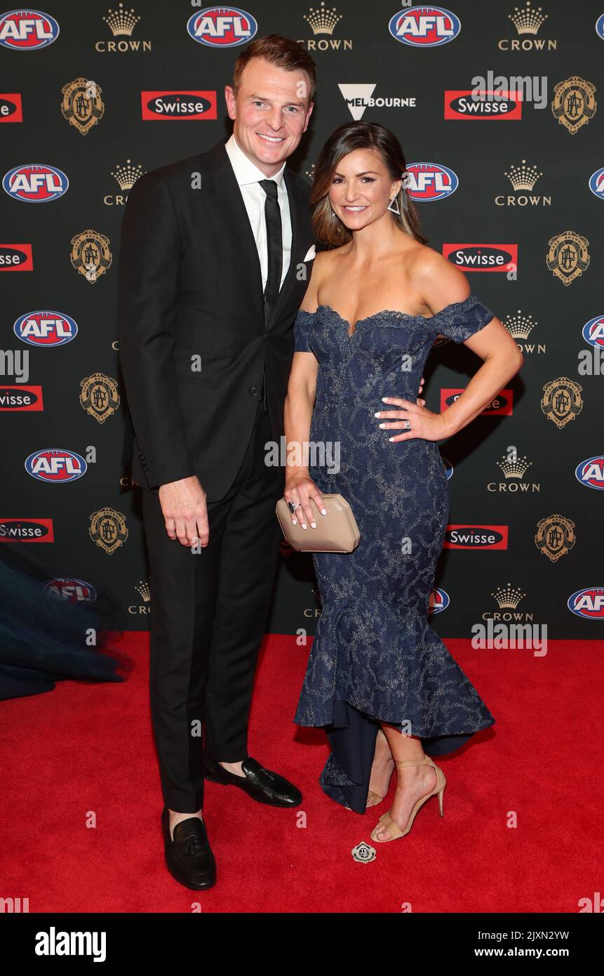 Brendan Goddard of Essendon and his wife Rosie Goddard pose for a ...
