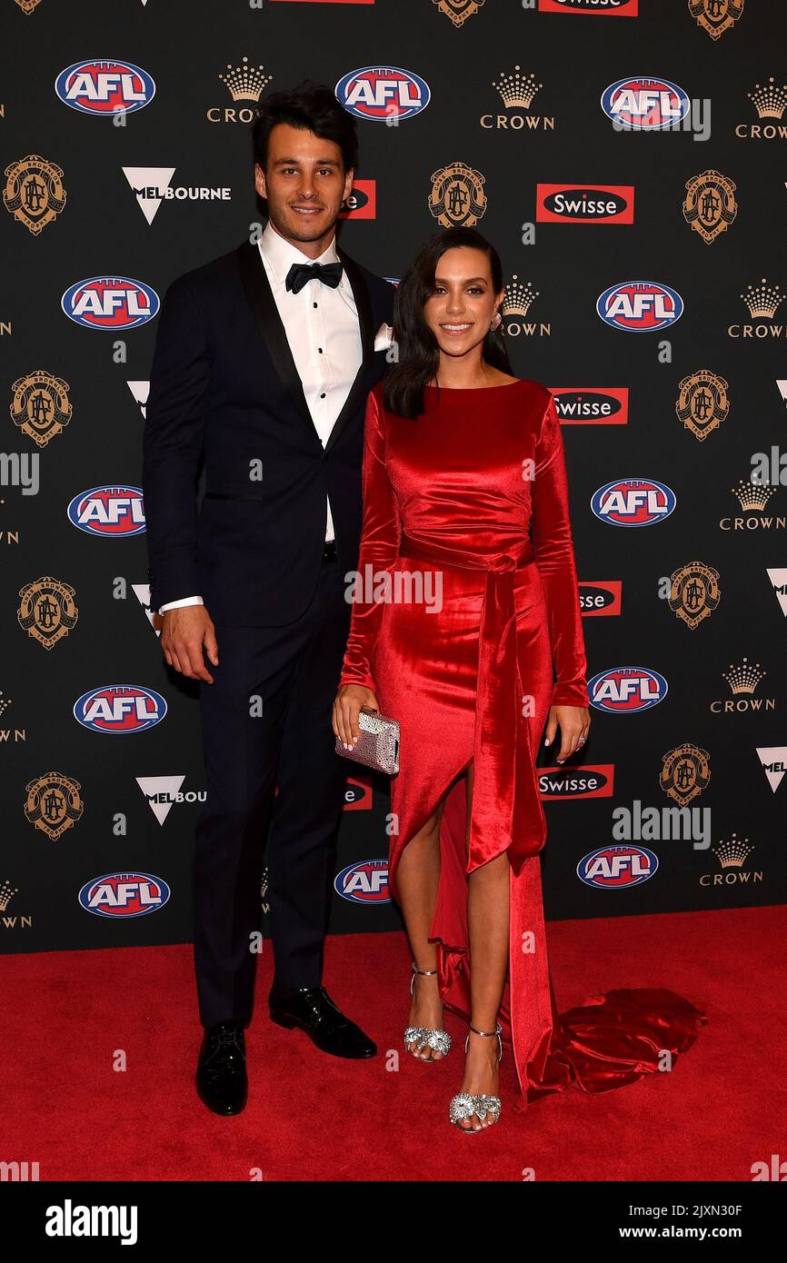 Robbie Tarrant of North Melbourne and wife Jess Tarrant pose for a ...