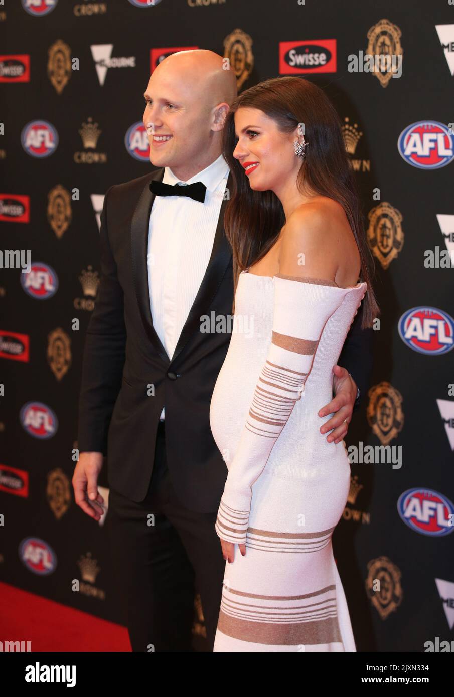 Gary Ablett and his wife Jordan Ablett pose for a photograph on the red ...
