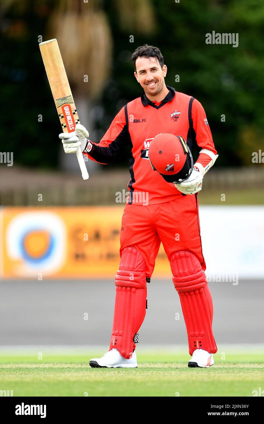 Redbacks batsman Tom Cooper celebrates reaching a century during the ...