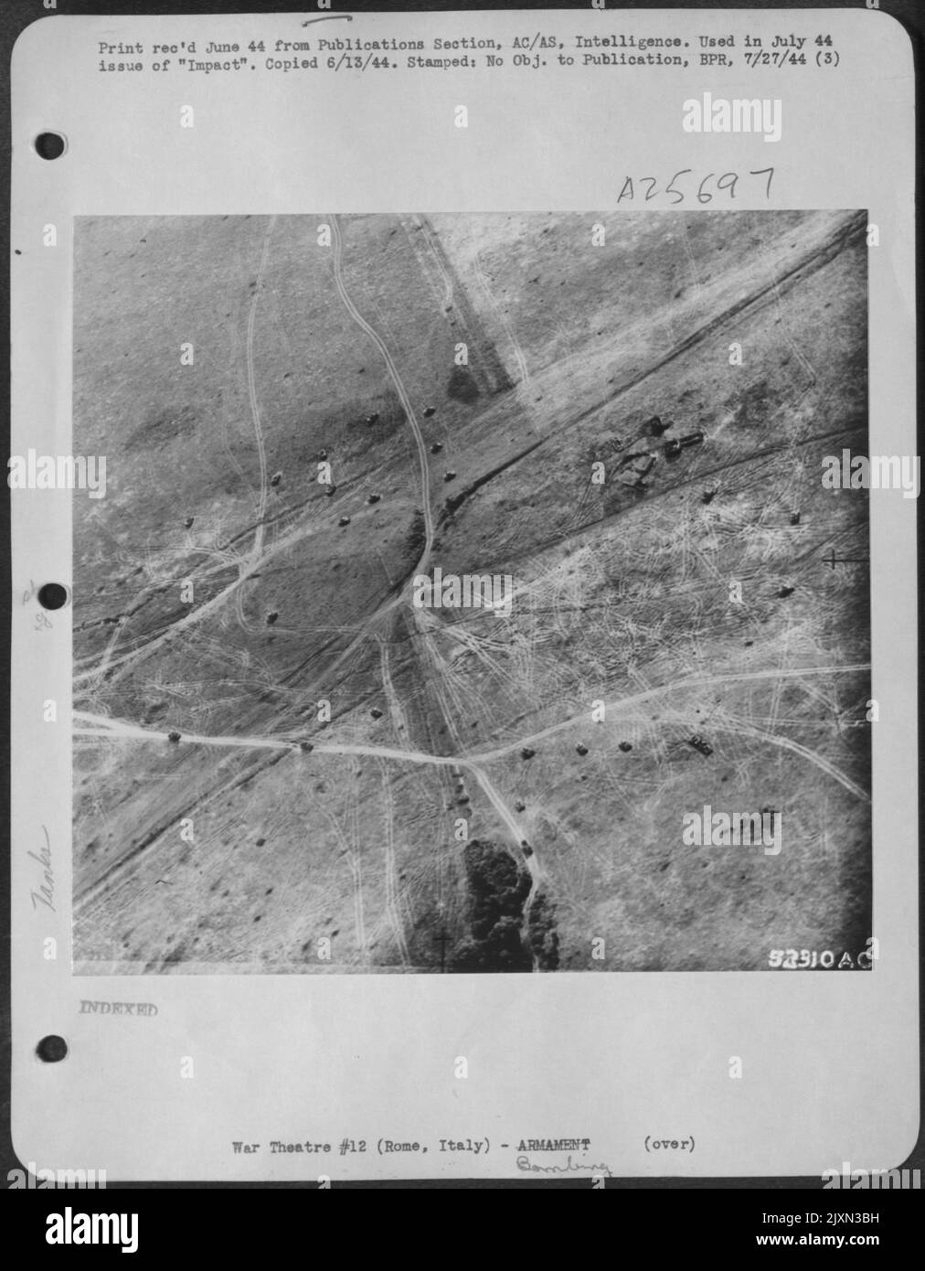 Enemy tanks are dispersed as Douglas A-20 moves in on strafing attack ...