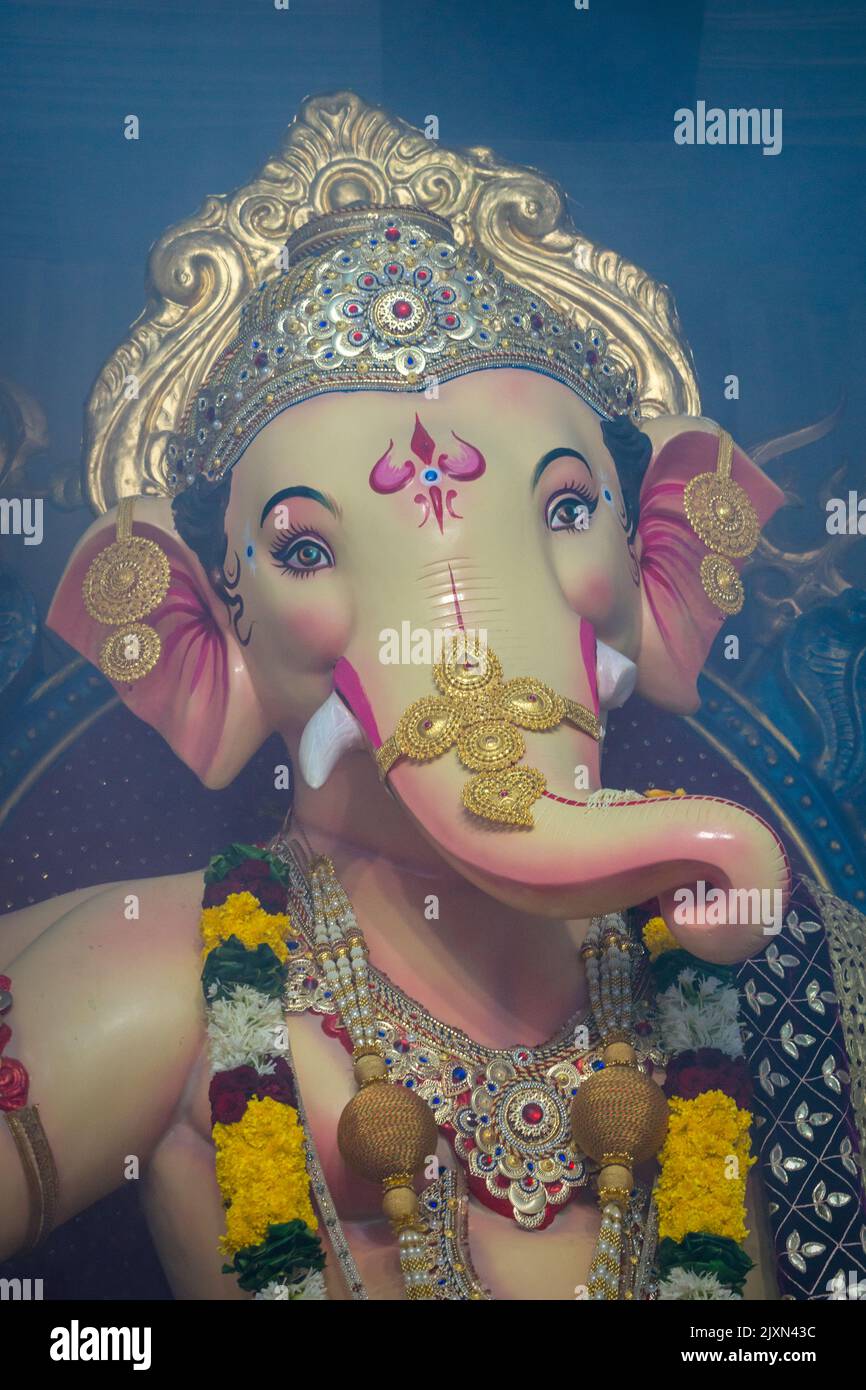 A beautiful idol of Lord Ganesha being worshipped at a mandal in Mumbai ...