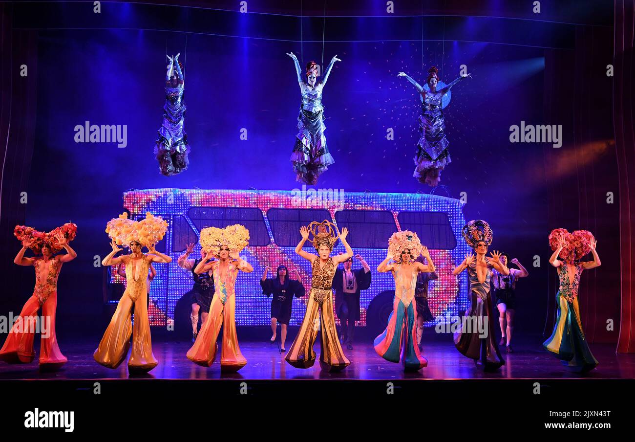 The cast of the musical Priscilla Queen of the Desert perform during a ...